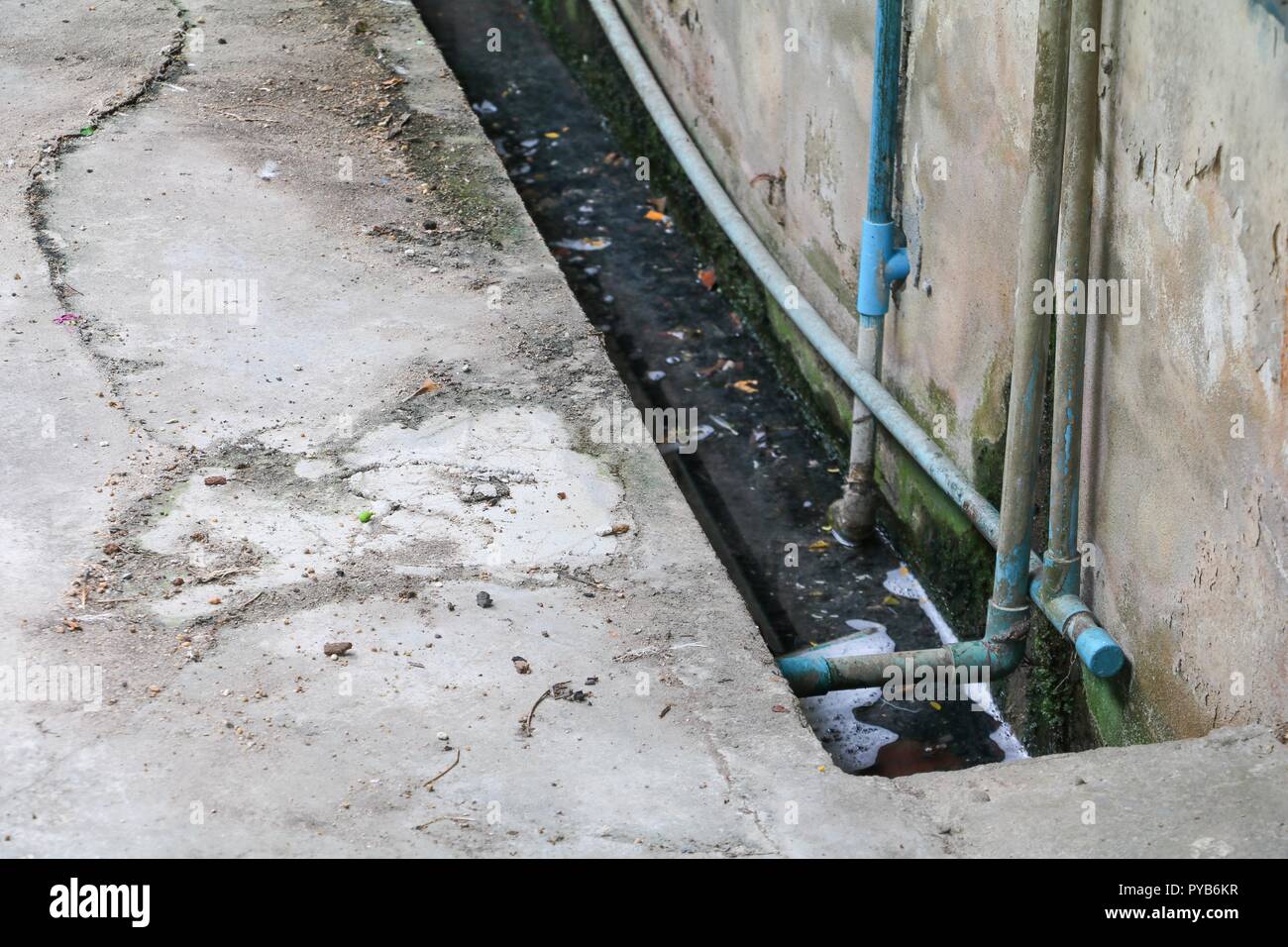 water drain or ditch on the road Stock Photo - Alamy