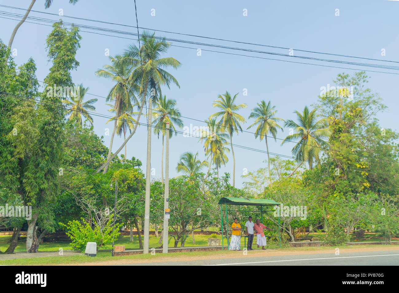 March 5, 2018. Sri Lanka, Hikkaduwa. People at the bus stop Stock Photo ...