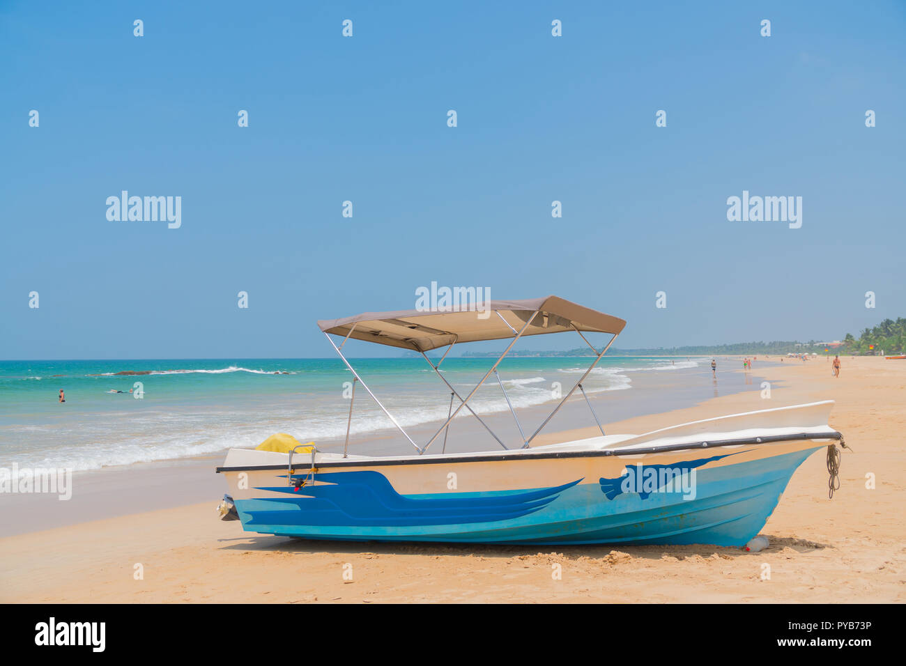 Boats in the sand on the beach Stock Photo - Alamy