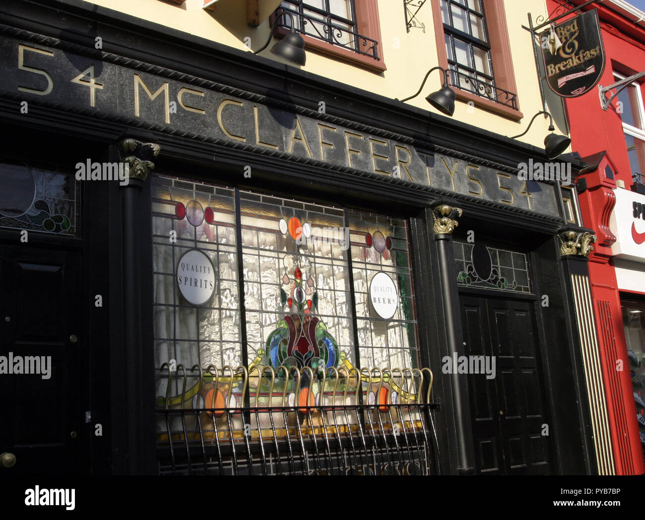 A traditional looking pub; McClaffertys bar in the Irish town of ...