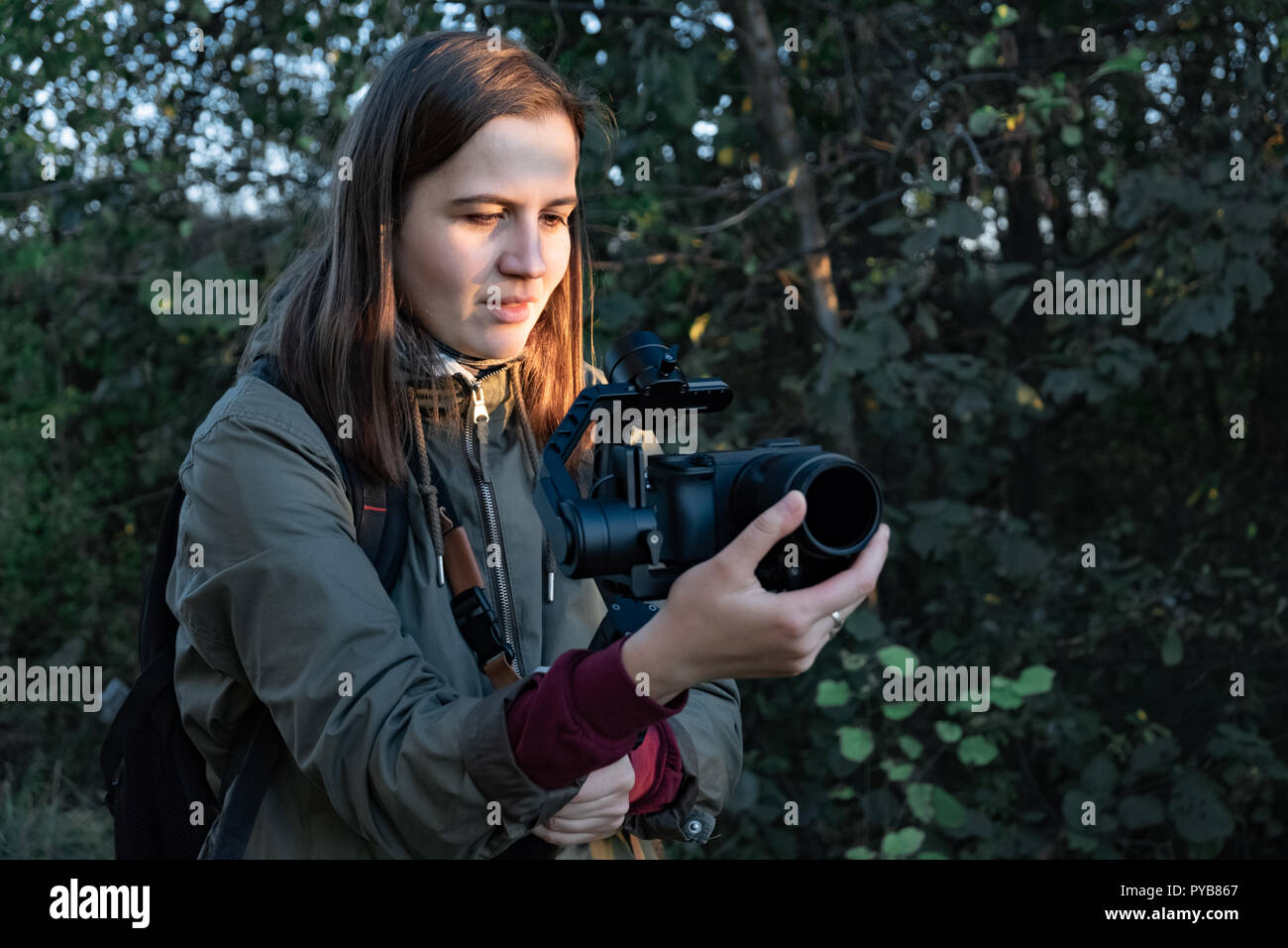 Woman girl filming movie camera hi-res stock photography and images - Alamy