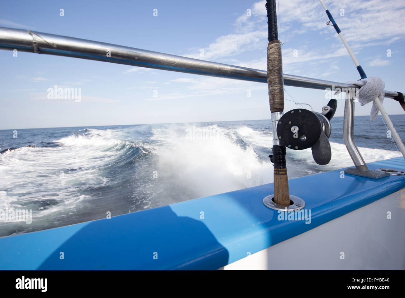 waves behind fishing boat Stock Photo - Alamy
