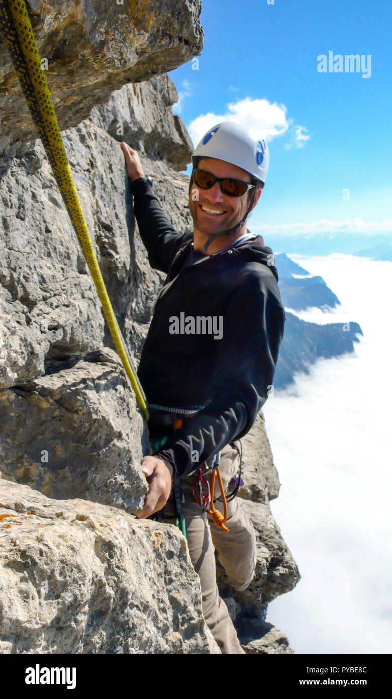Male mountain climber helmet smile hi-res stock photography and images ...