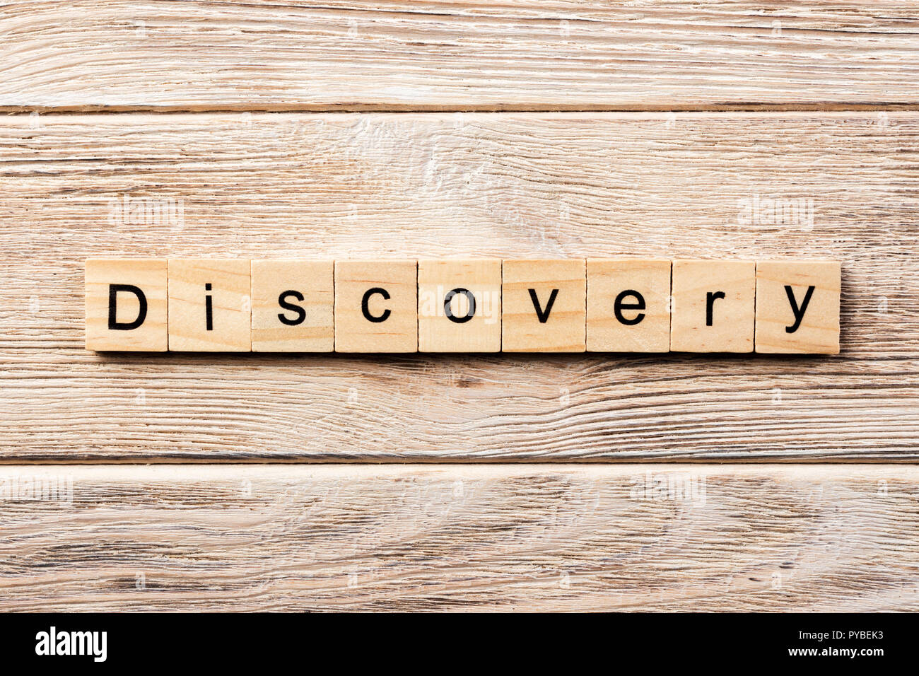 discovery word written on wood block. discovery text on table, concept ...