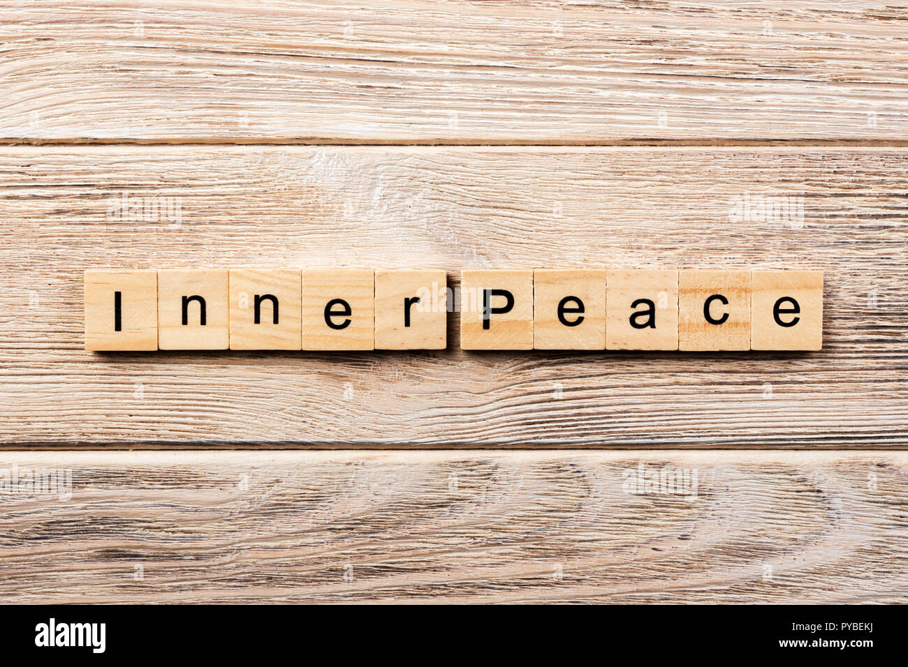 inner peace word written on wood block. inner peace text on table ...