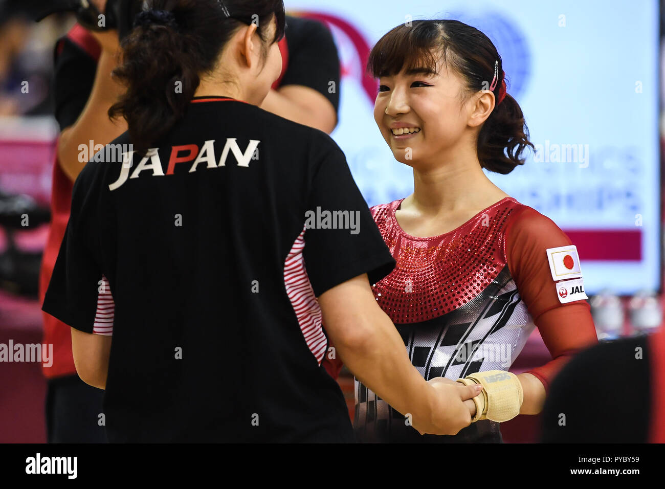 Doha, Qatar. 27th Oct, 2018. ASUKA TERAMOTO greats her coach after ...