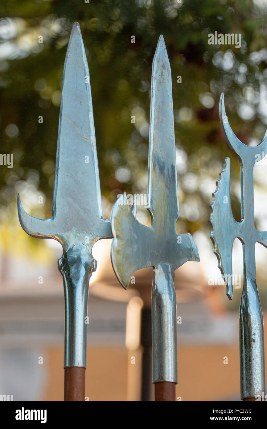 Several medieval blades weapons on display on a fair Stock Photo - Alamy