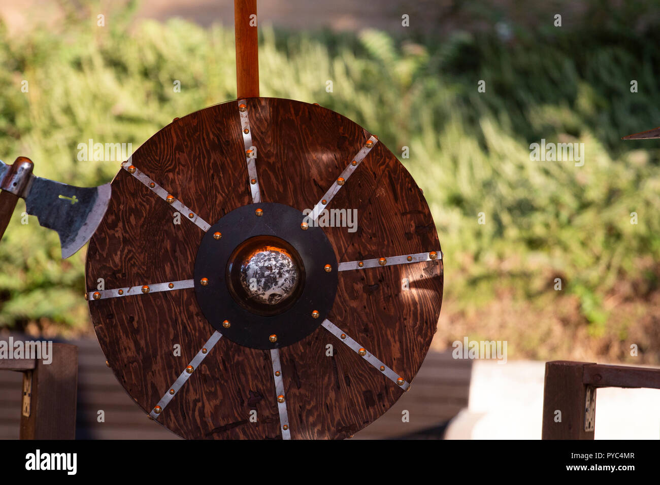 Round medieval wooden shield at display on a fair Stock Photo - Alamy
