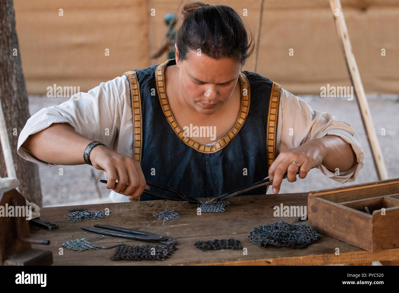 SILVES, PORTUGAL - August 11th, 2018 : Medieval blacksmith chainmail ...