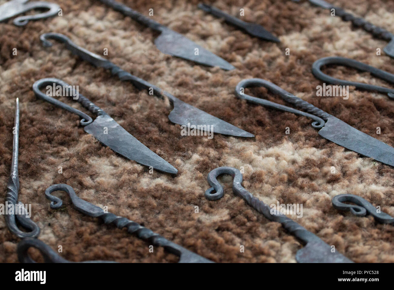 Close up view of a display of medieval small daggers Stock Photo - Alamy
