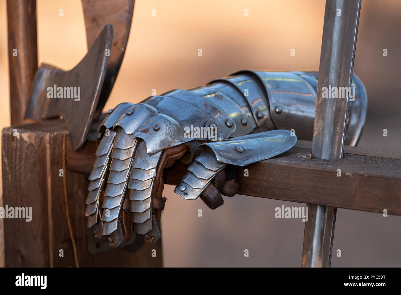 Close view of Knight iron gauntlet at display on fair Stock Photo - Alamy