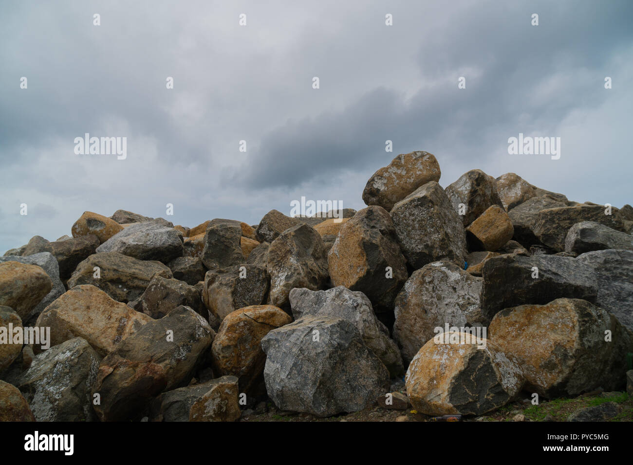 A ridge of rocks in the ocean Stock Photo - Alamy