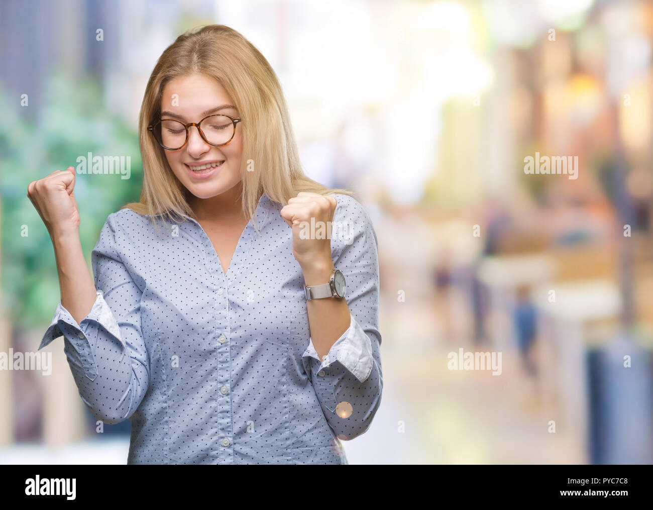 Young caucasian business woman wearing glasses over isolated background ...