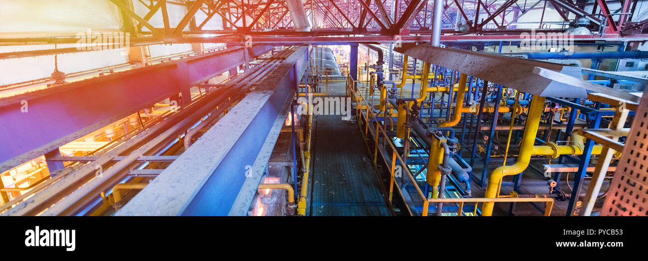 Fiberglass production industry equipment at manufacture background ...