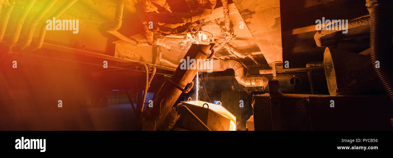 Process of fiberglass production at manufacture background with ...