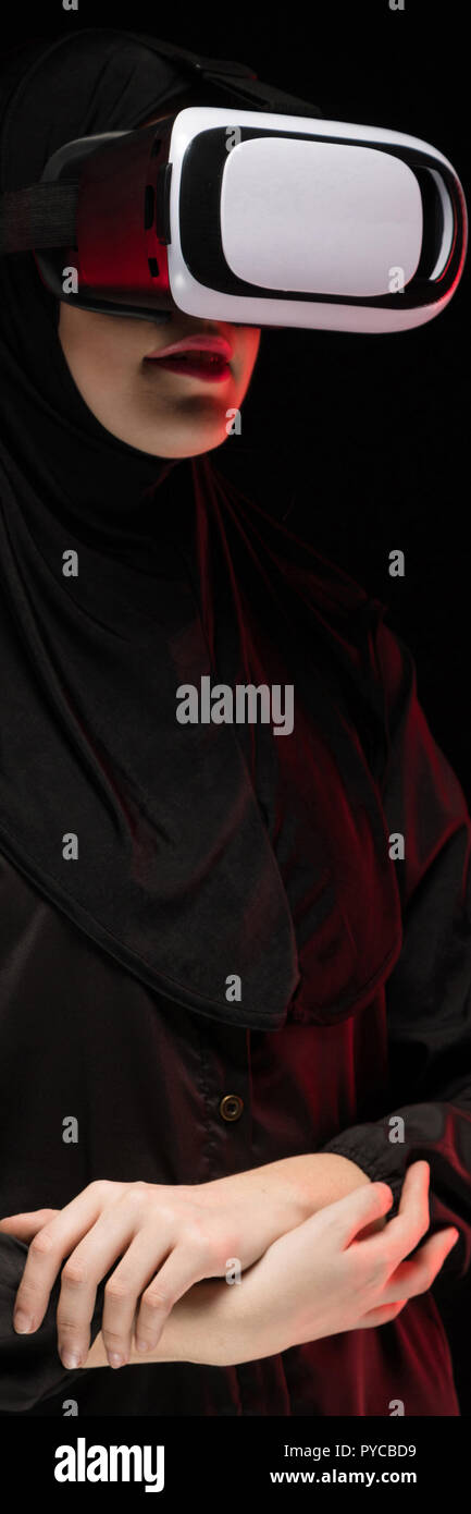 Portrait of beautiful smart young muslim woman wearing black hijab ...