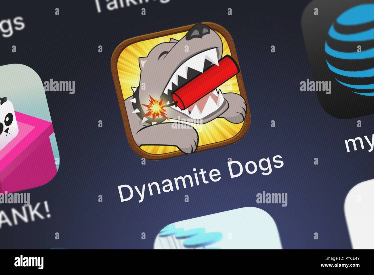 London, United Kingdom - October 26, 2018: Close-up shot of the Dynamite Dogs mobile app from ...