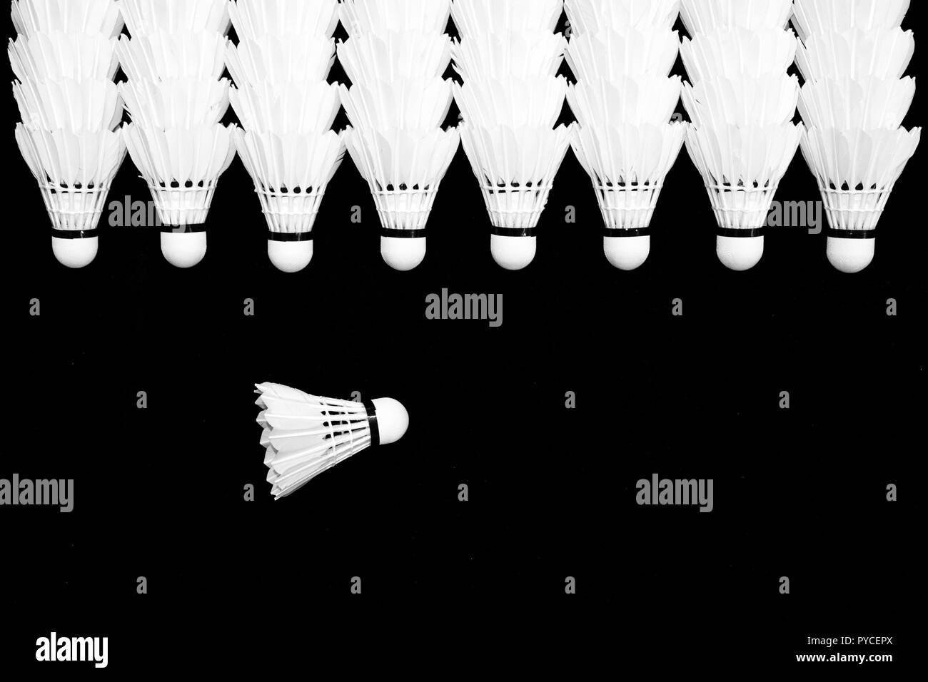 White shuttlecock isolated on black background. Image can be used as ...