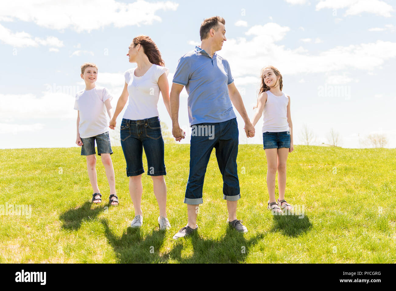 Family having fun in field hi-res stock photography and images - Alamy