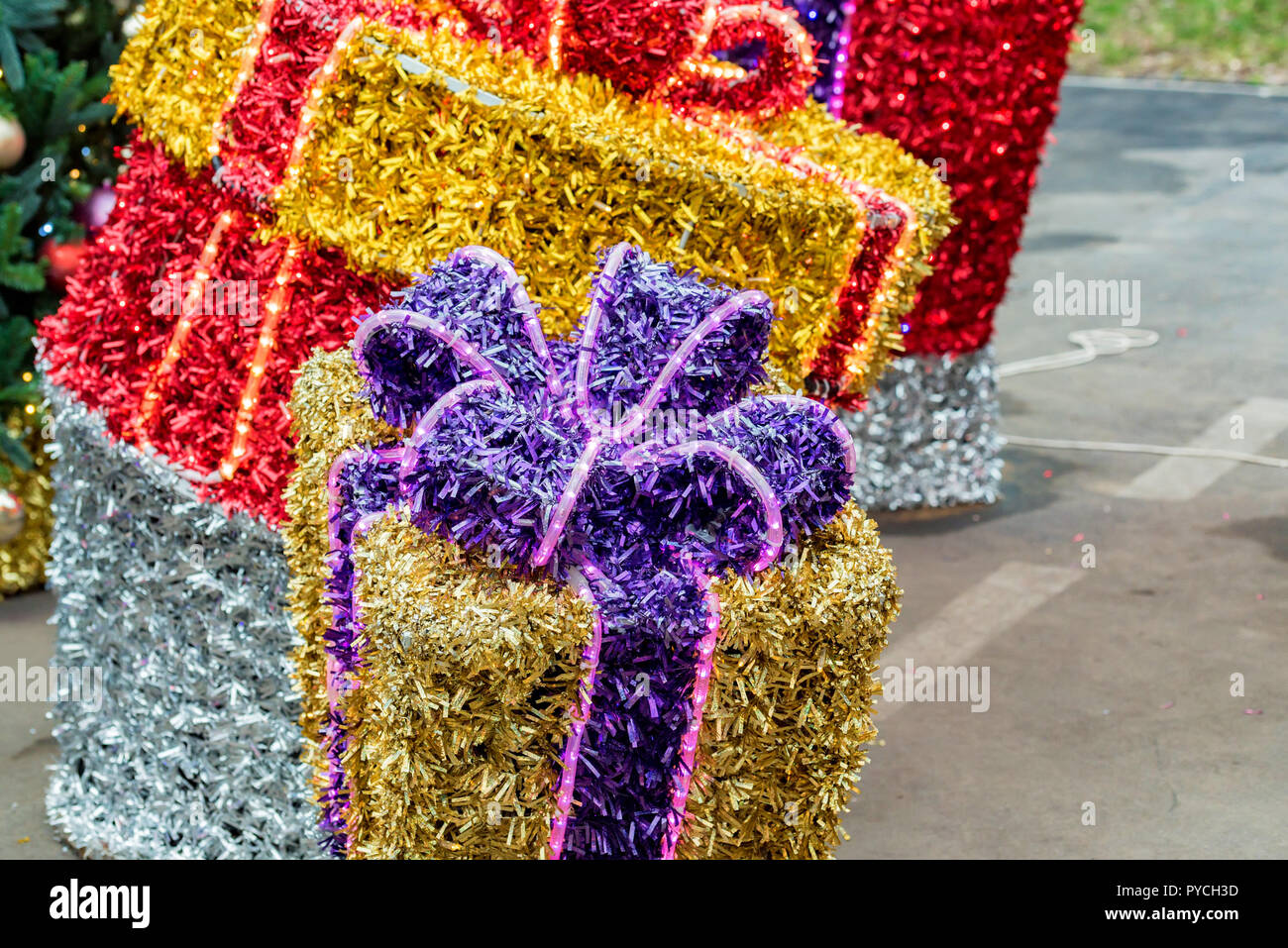 Christmas decorations gift box made of tinsel Stock Photo - Alamy