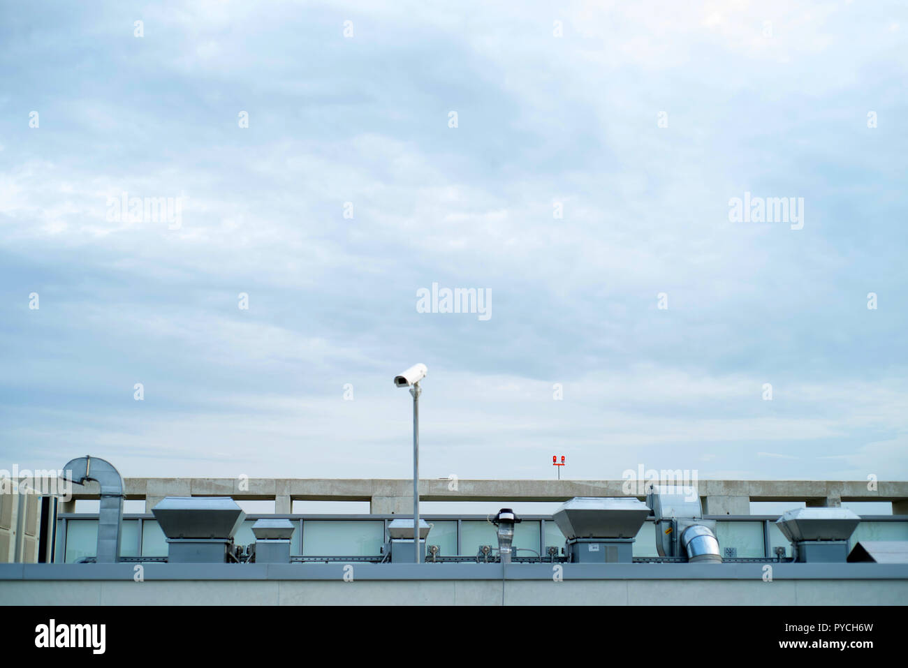 Industrial building rooftop with ventilation and metal pipes Stock ...