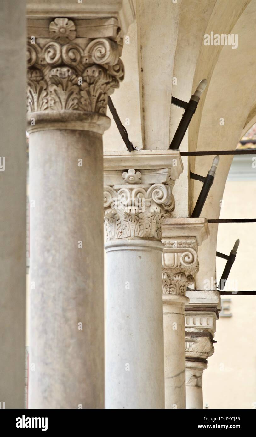 View of marble white columns and sculpted capitols of San Zeno ...