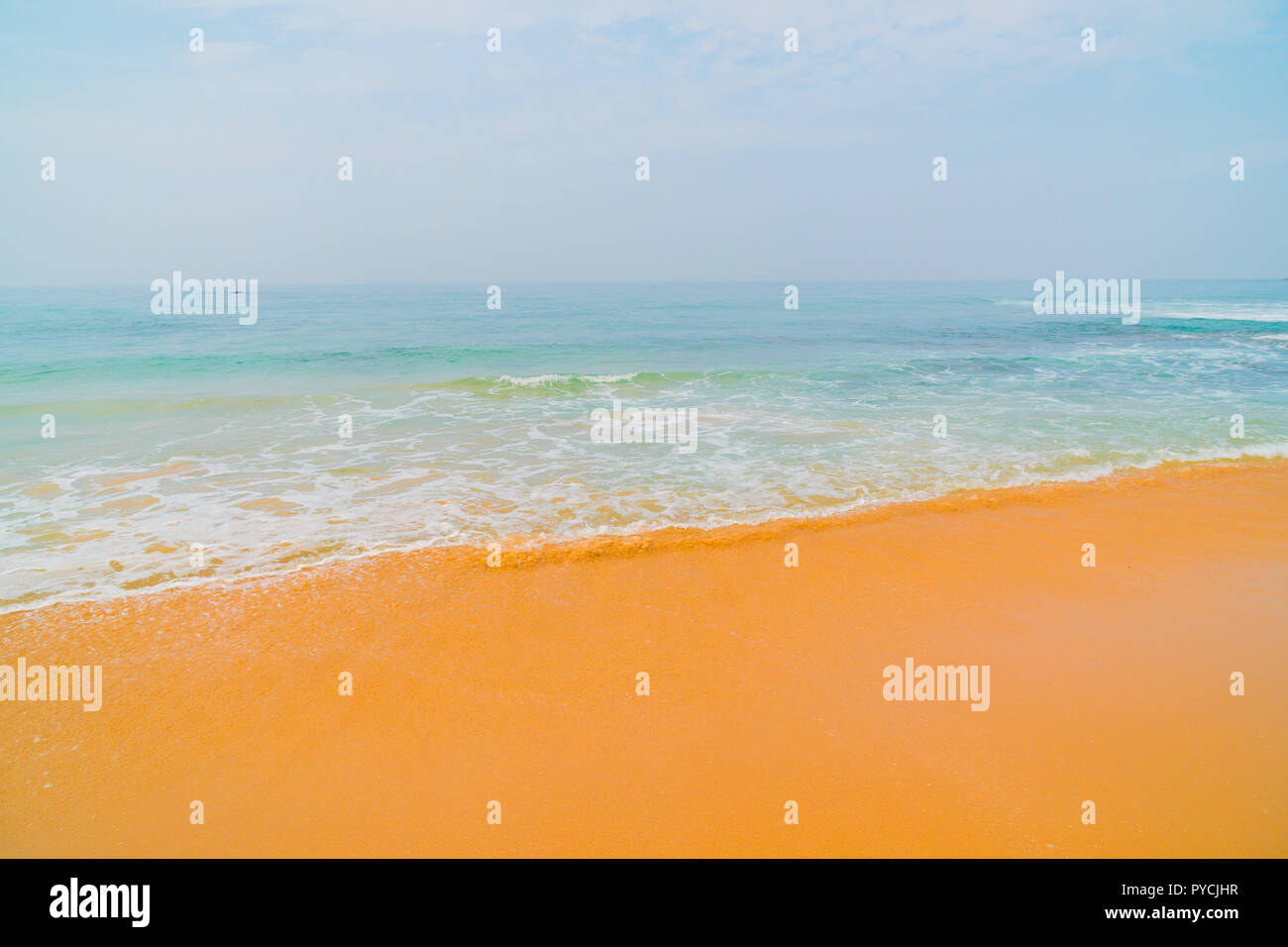 Water and sand on a tropical beach Stock Photo - Alamy