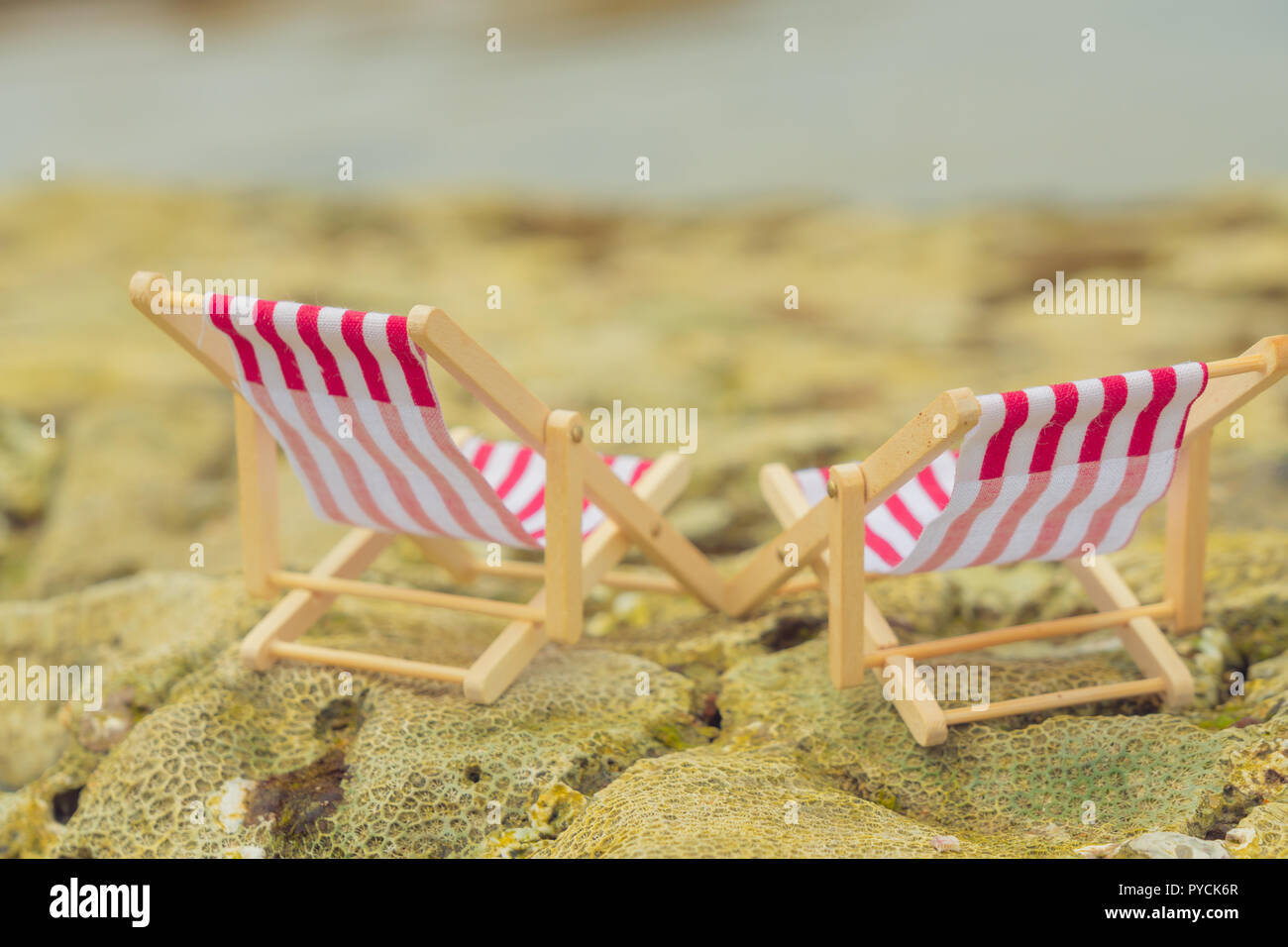 Striped red beach chair Stock Photo - Alamy