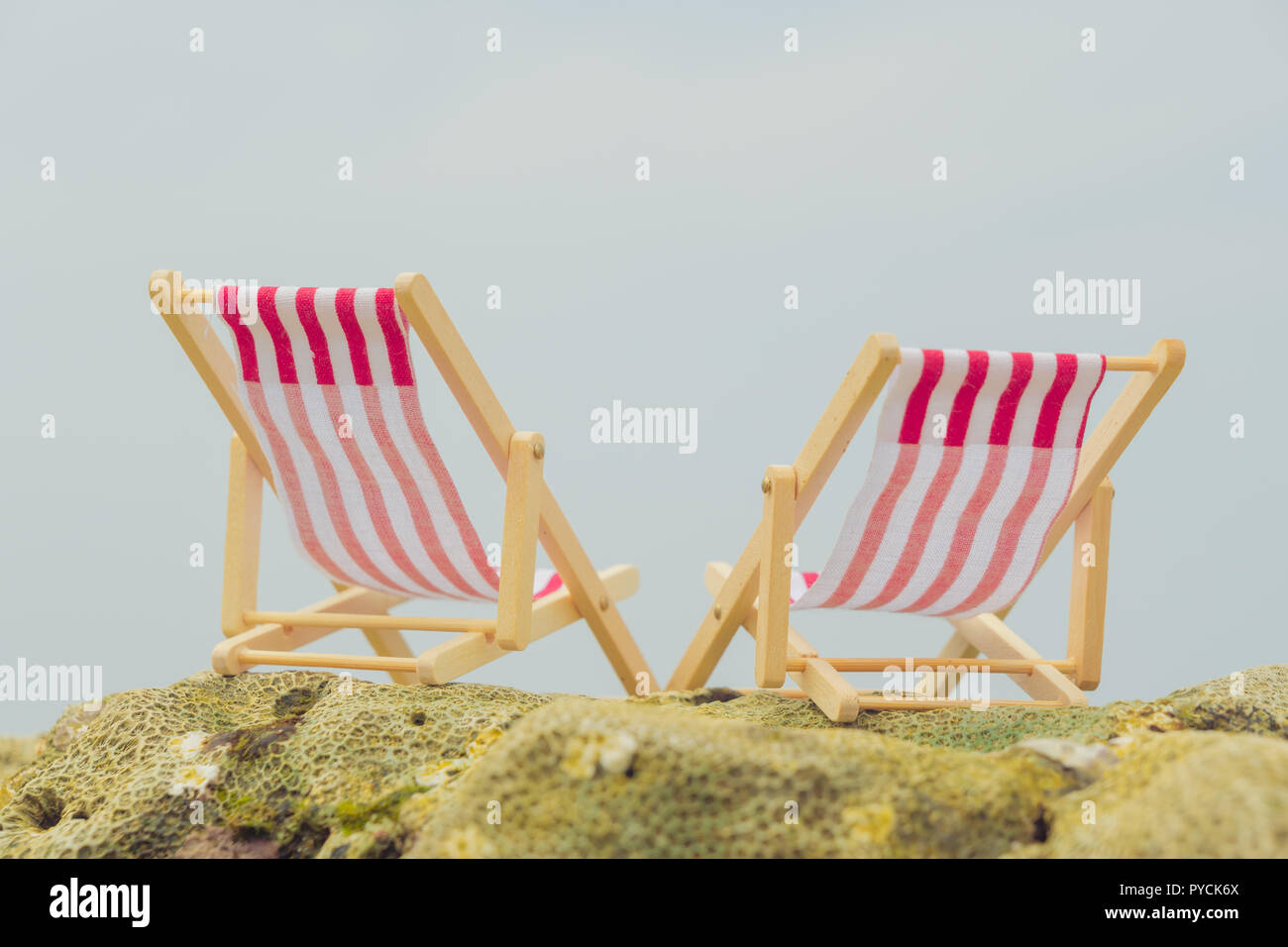 Striped red beach chair Stock Photo - Alamy