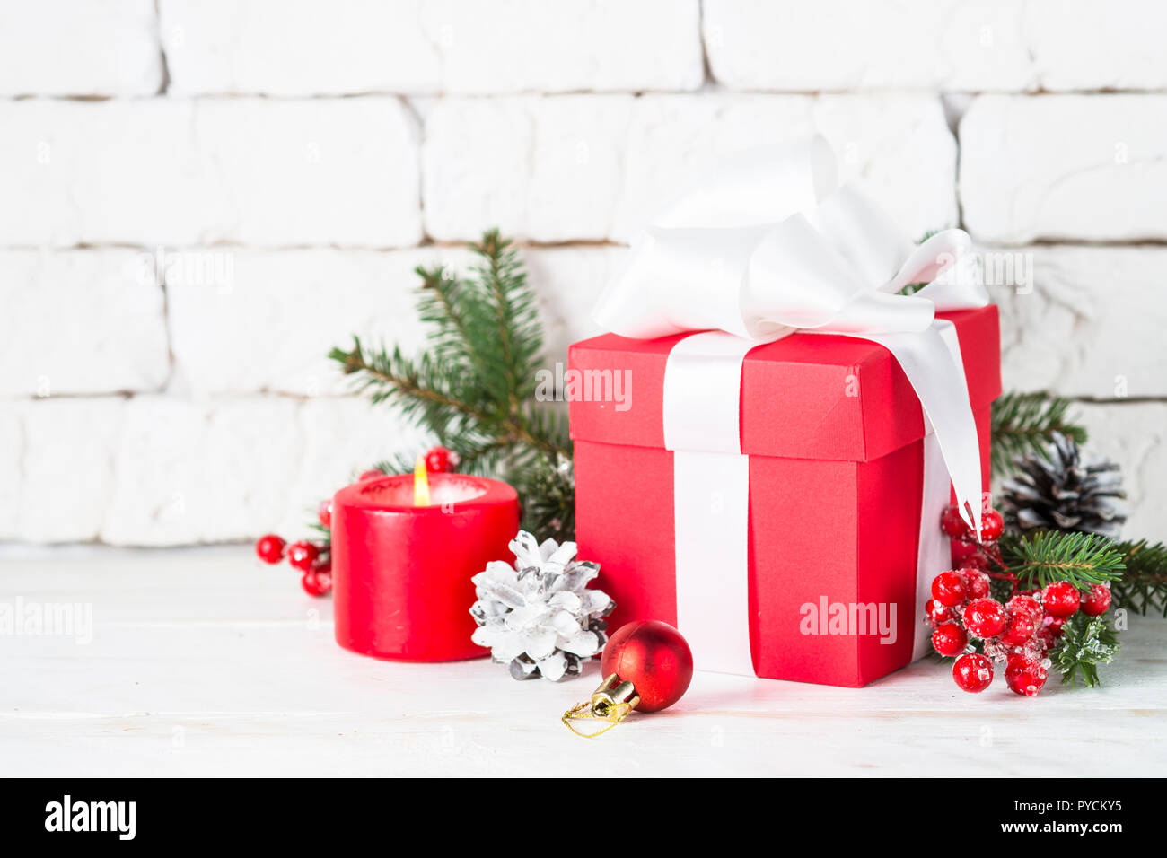 Christmas present box and decorations on white background Stock Photo ...