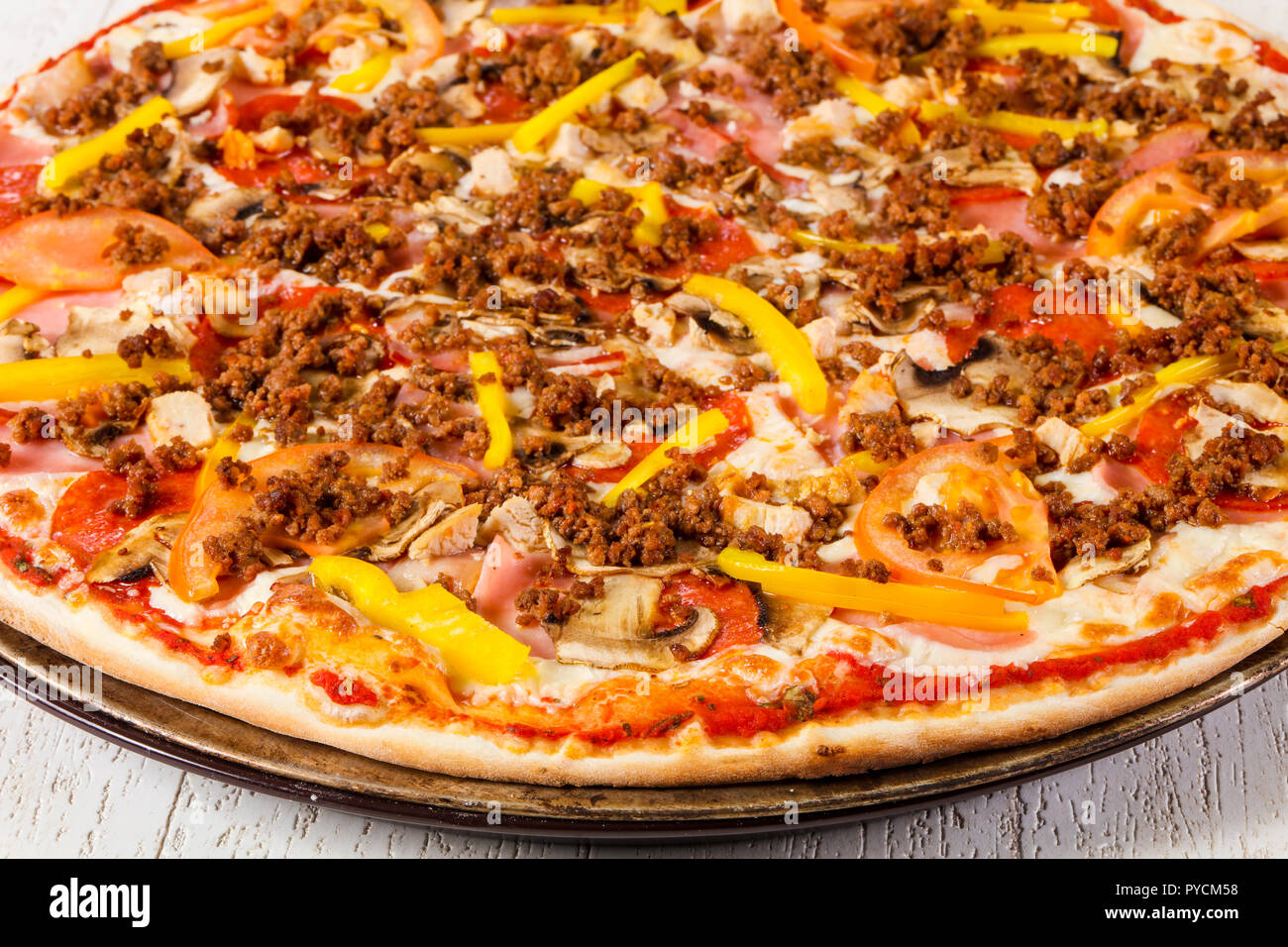 Pizza with minced meat and vegetables Stock Photo - Alamy