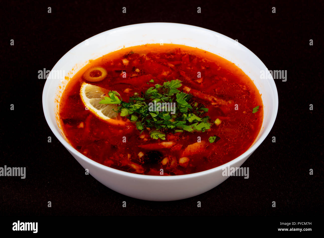 Russian Solyanka soup with olives Stock Photo - Alamy