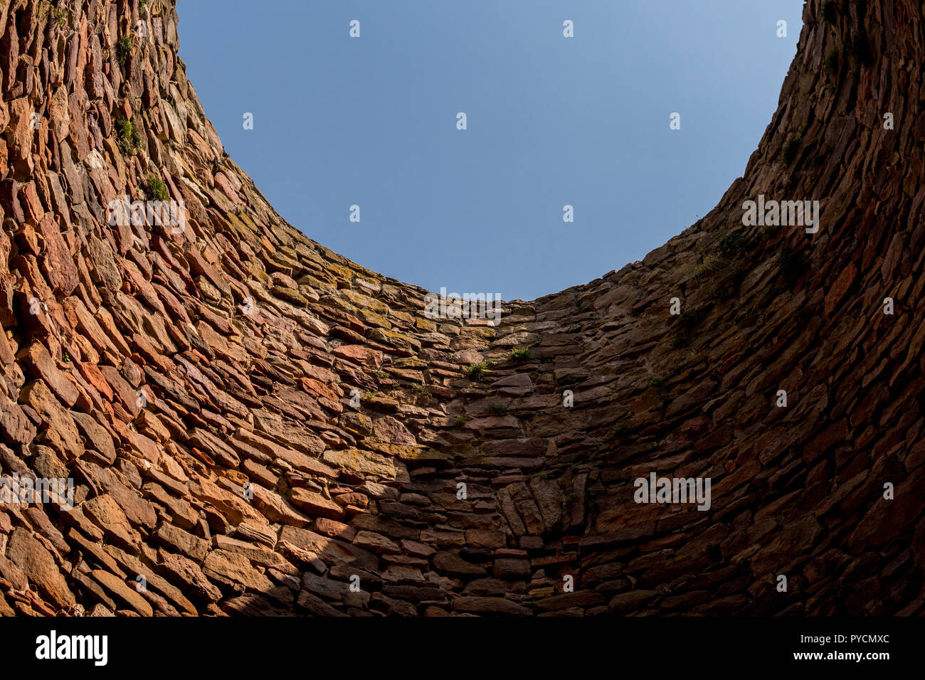 interior of a big chimney of old steel mill made of stone blocks Stock ...