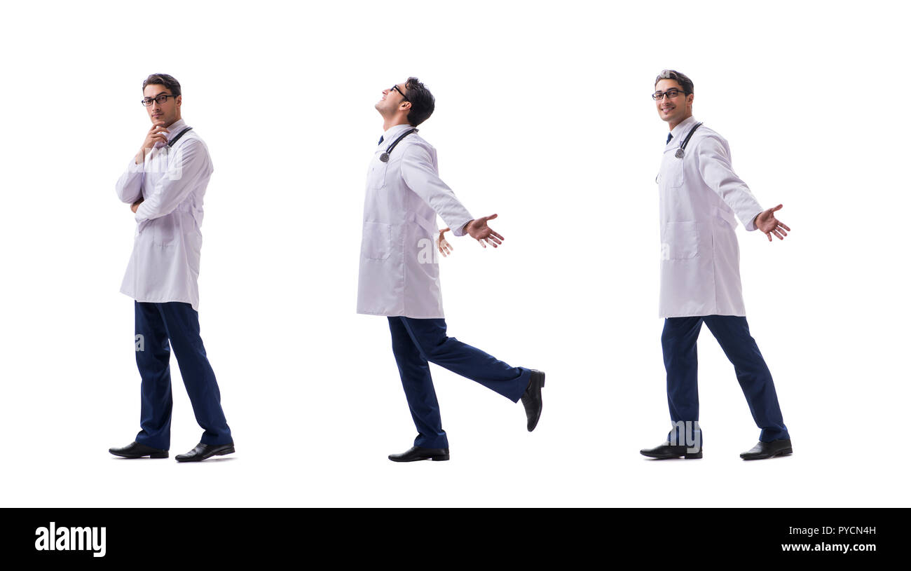 Young doctor physician standing walking isolated on white background ...