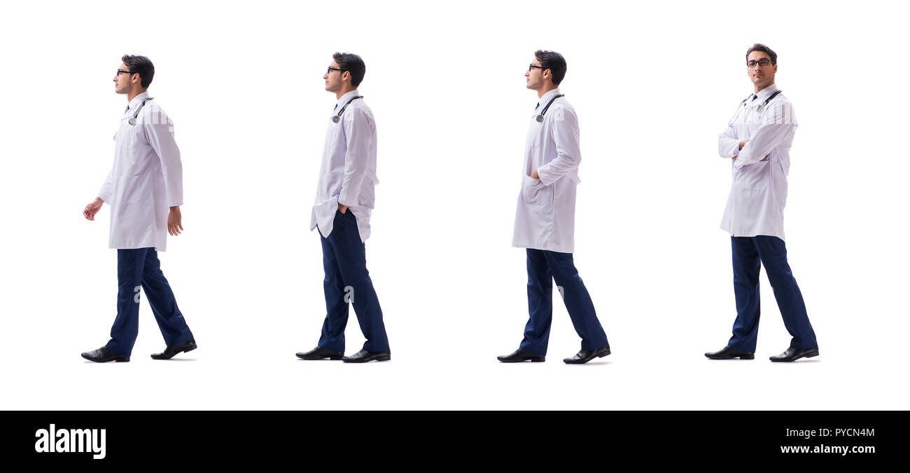 Young doctor physician standing walking isolated on white background ...