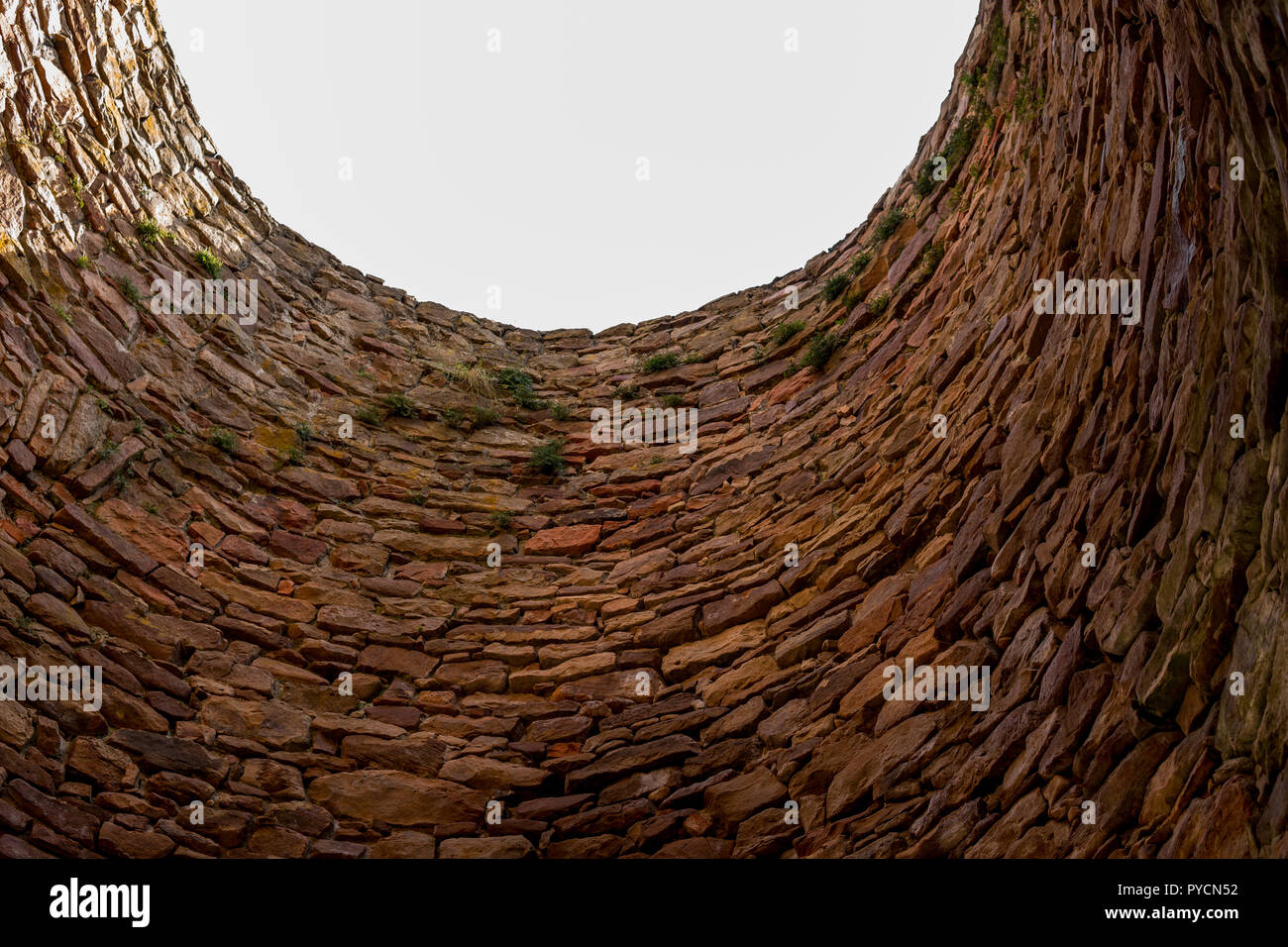 interior of a big chimney of old steel mill made of stone blocks Stock ...