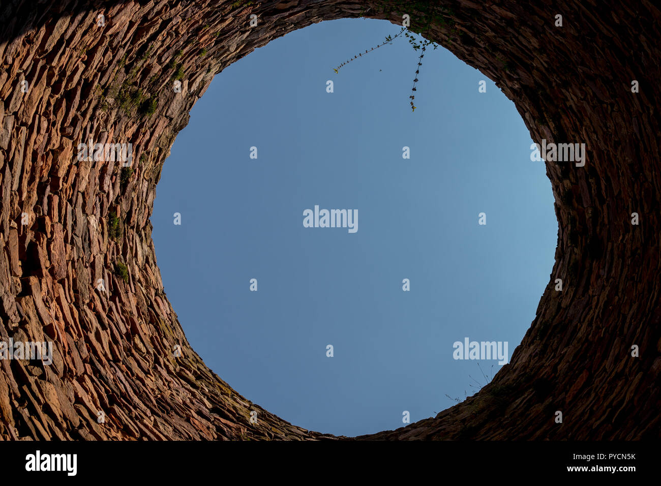 interior of a big chimney of old steel mill made of stone blocks Stock ...