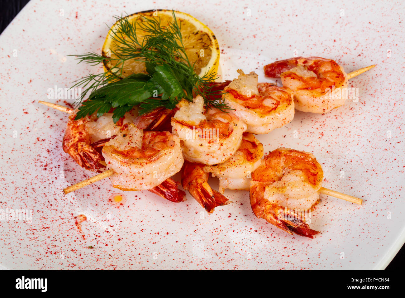 Tasty tiger prawn with garlic sauce Stock Photo - Alamy