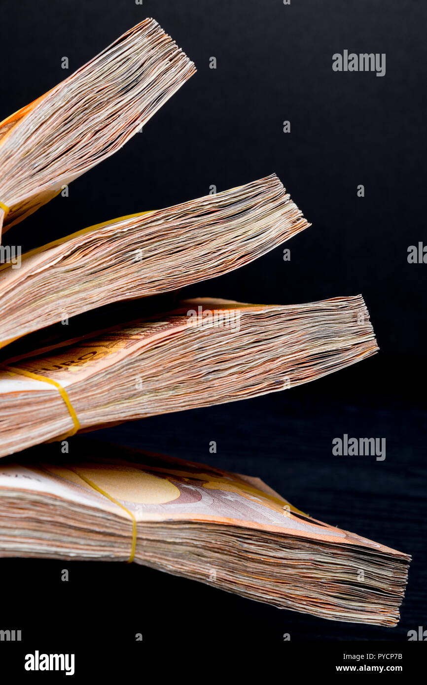 Pile of 50 real euro notes 50-euro banknotes under rubber band ...