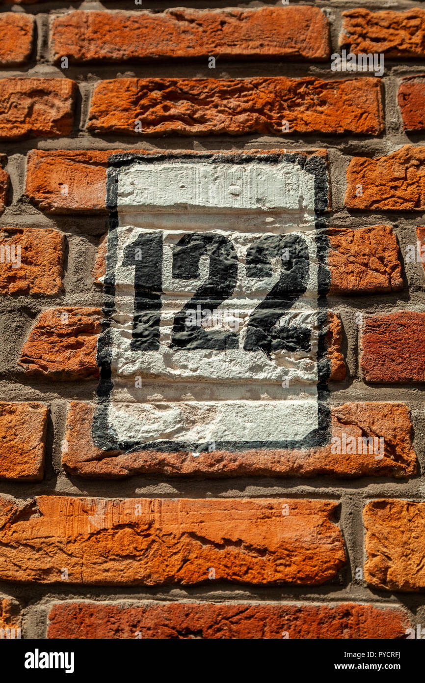 House number twenty-two 22 painted black on white render in rouch basic ...