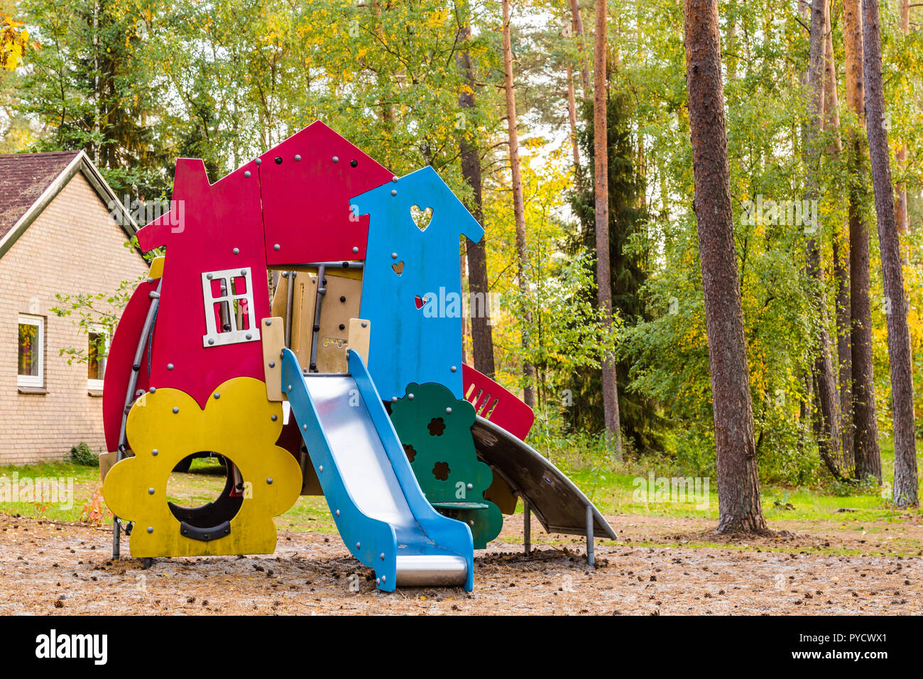 Colorful playground with slide Stock Photo - Alamy
