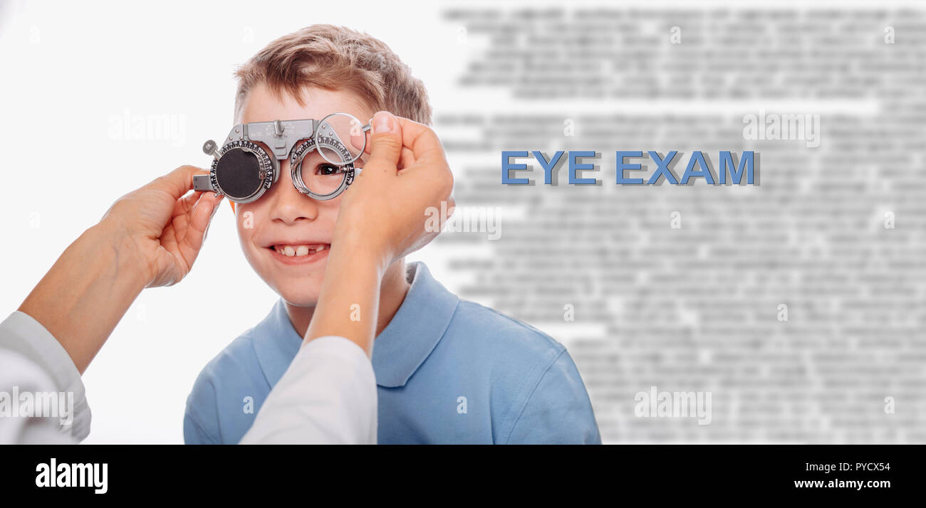 little boy, having his eyesight examining. Children eye examination ...