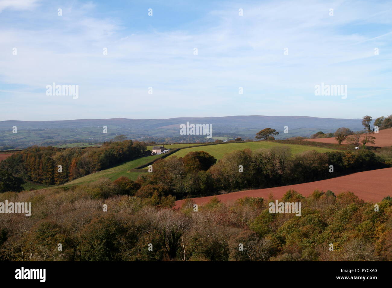 Berry Pomeroy, Devon, England: A farmhouse on a hilltop, farm fields ...