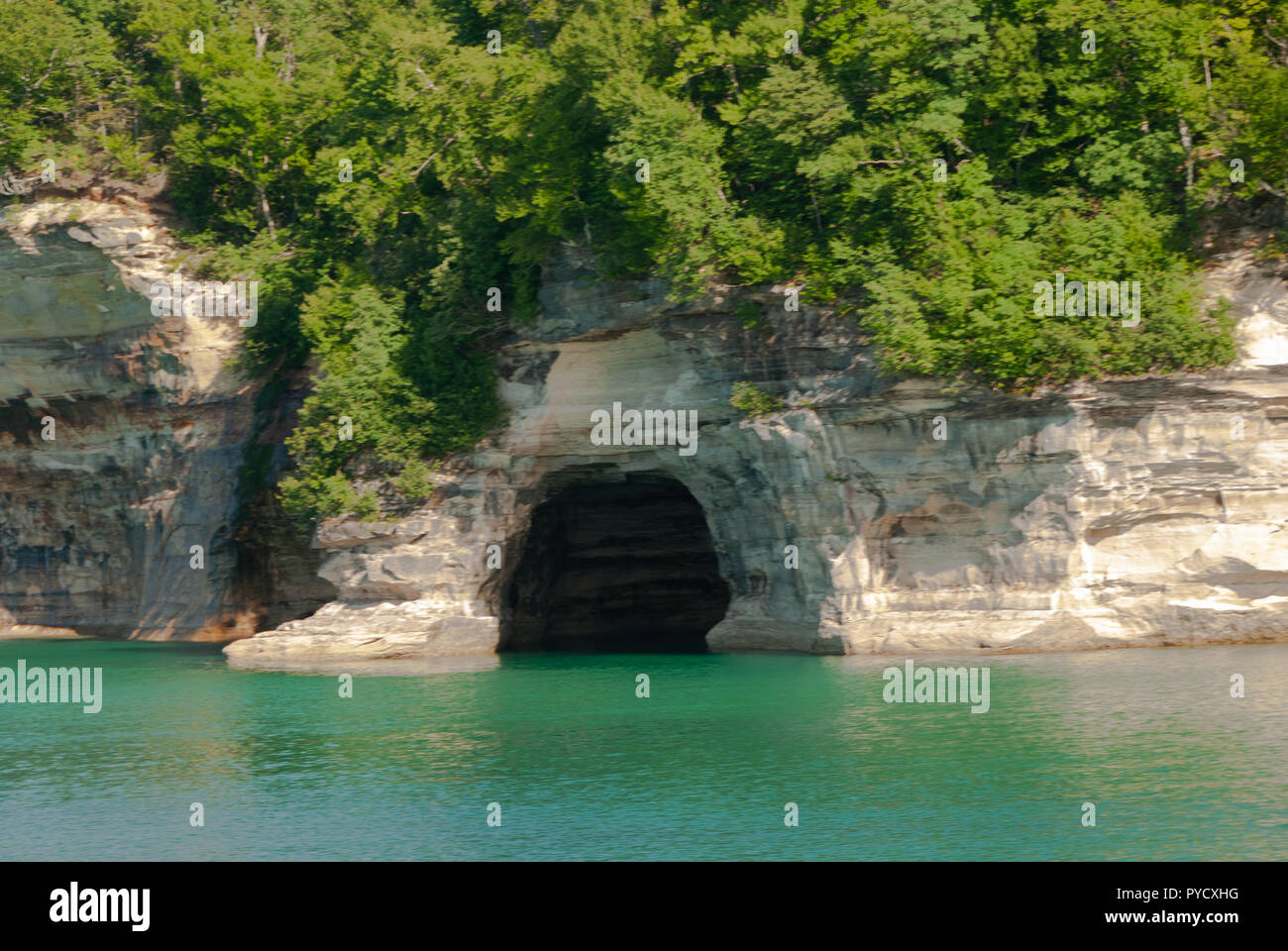 Pictured Rocks National Lakeshore hugs the south shore of Lake Superior ...