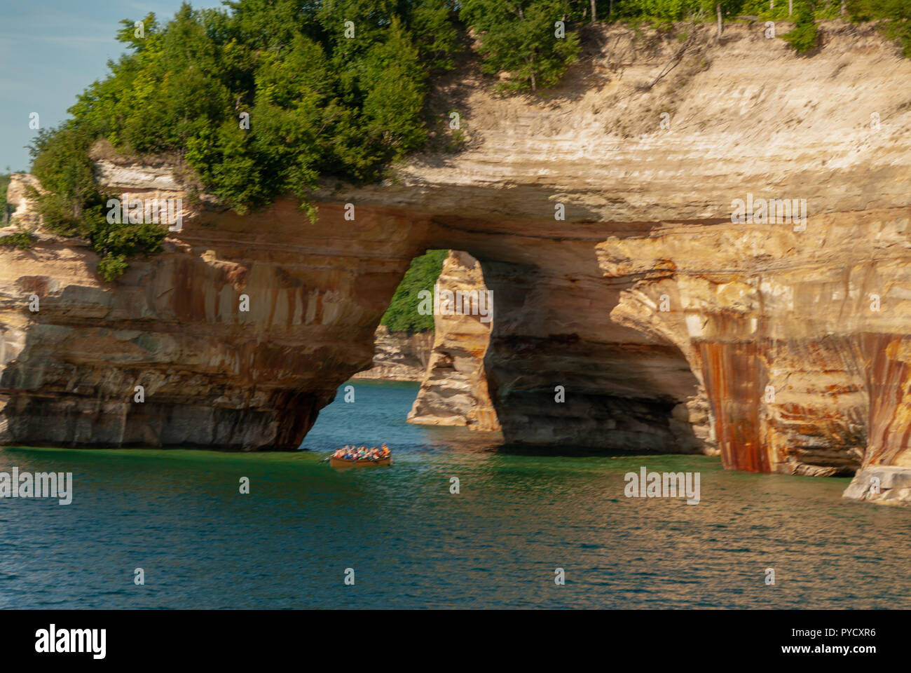Pictured Rocks National Lakeshore hugs the south shore of Lake Superior ...