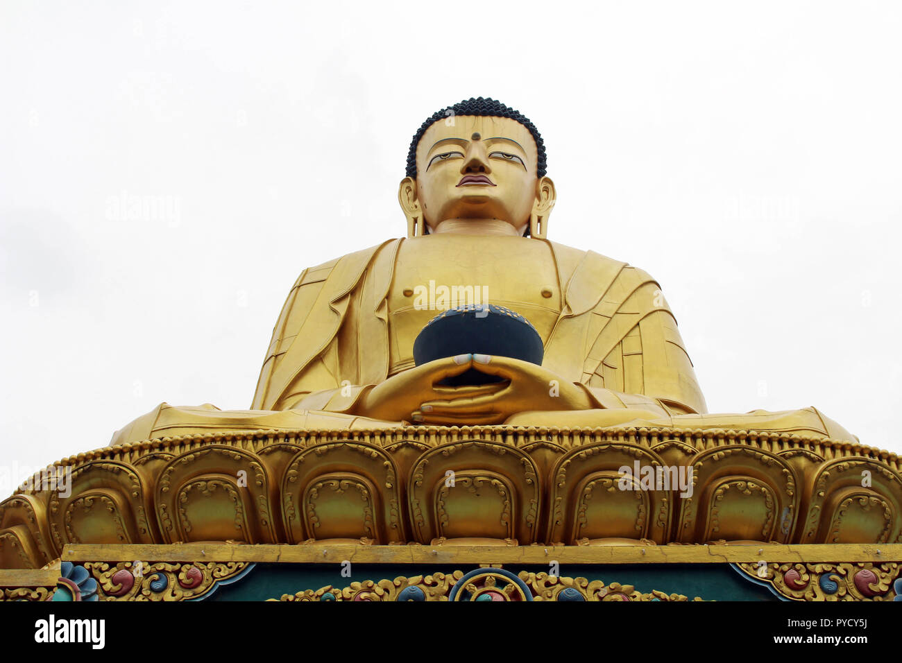 The golden Buddha statues and stupa at Amideva Park on the foothill of ...