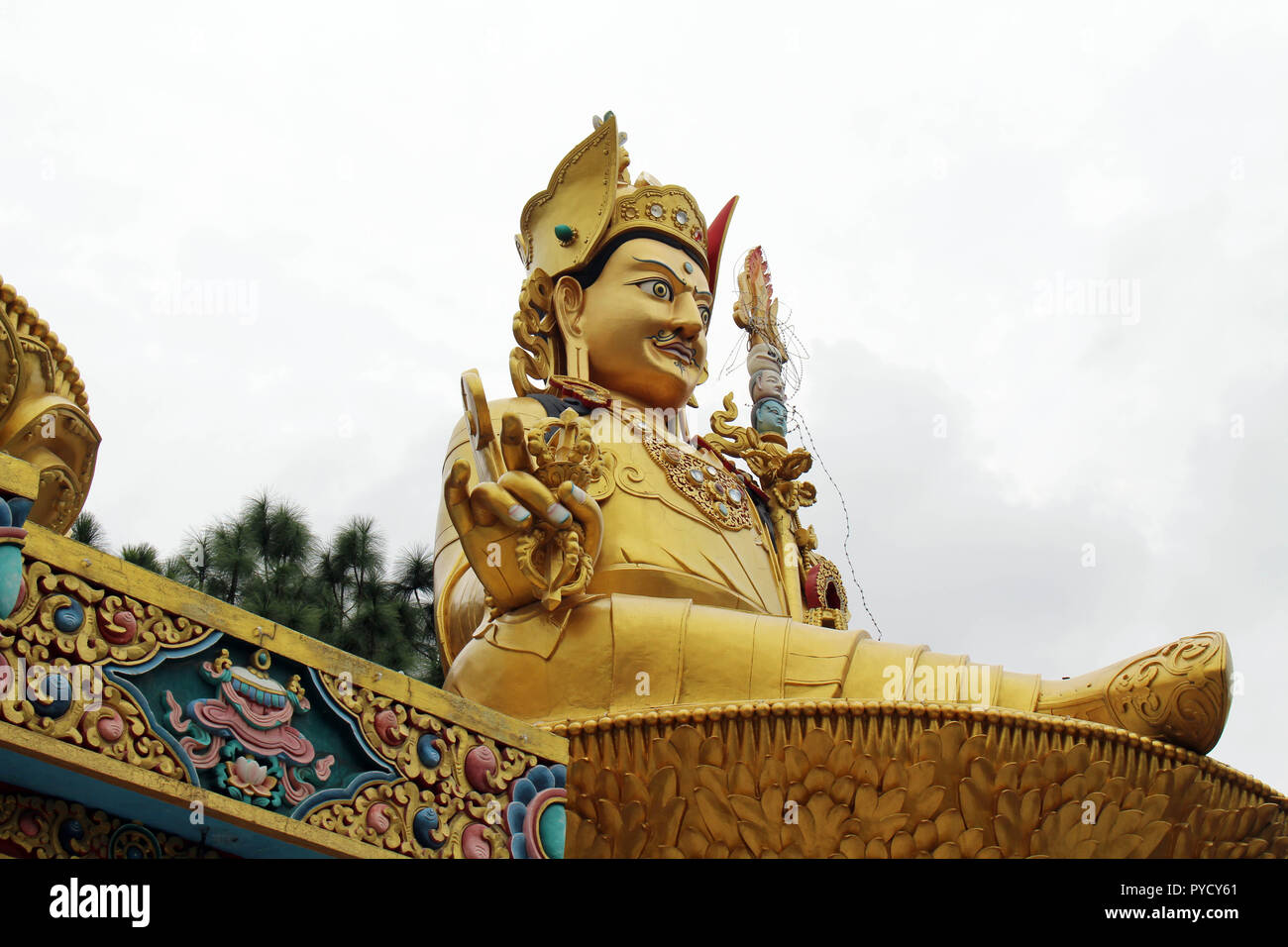 The golden Buddha statues and stupa at Amideva Park on the foothill of ...