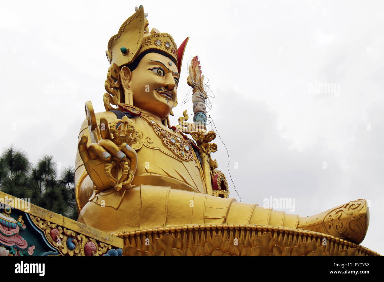The golden Buddha statues and stupa at Amideva Park on the foothill of ...