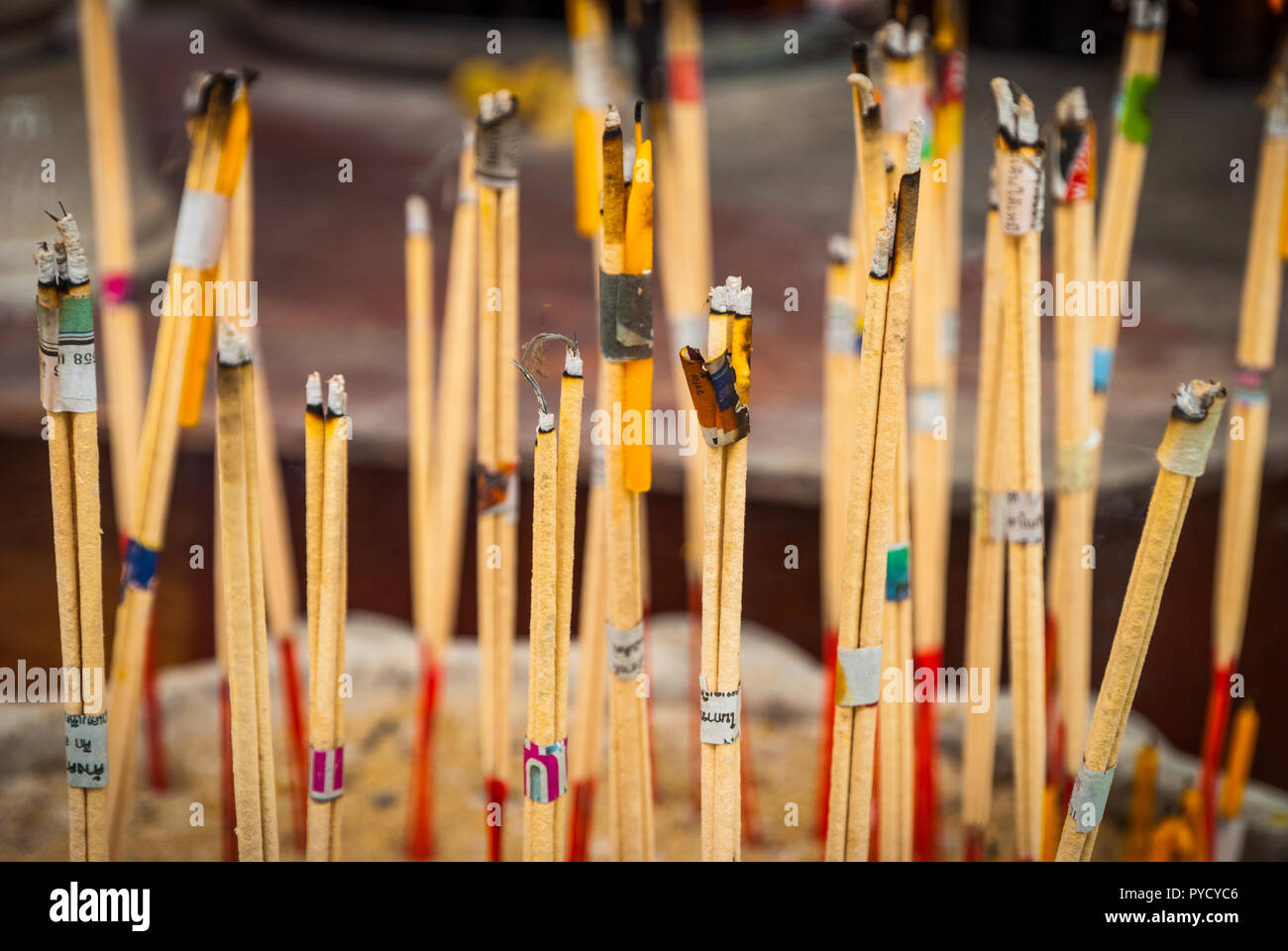 Incense sticks burning at buddhist temple in Thailand, close up Stock ...