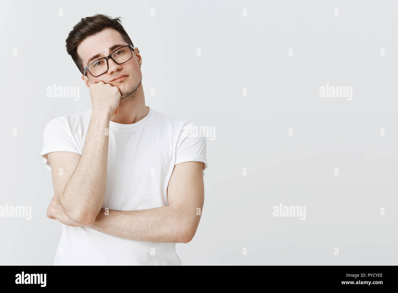 What boring day at work. Portrait of indifferent apathic and ...